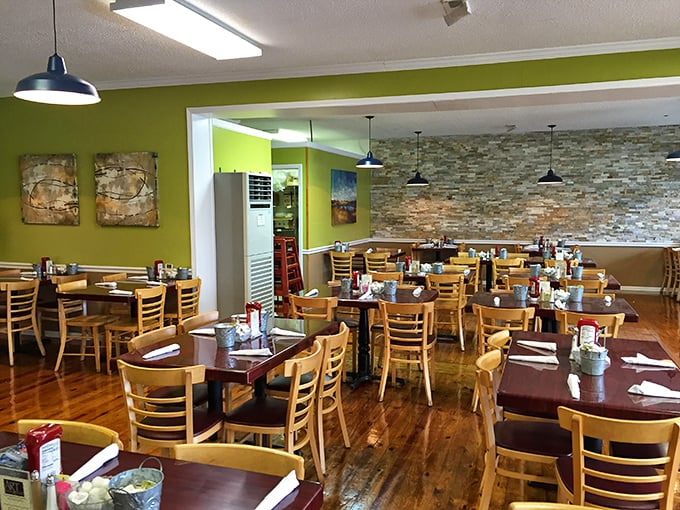 Bright lime-green walls and natural stone accents create a cheerful atmosphere that feels like a warm hug before your coffee even arrives.