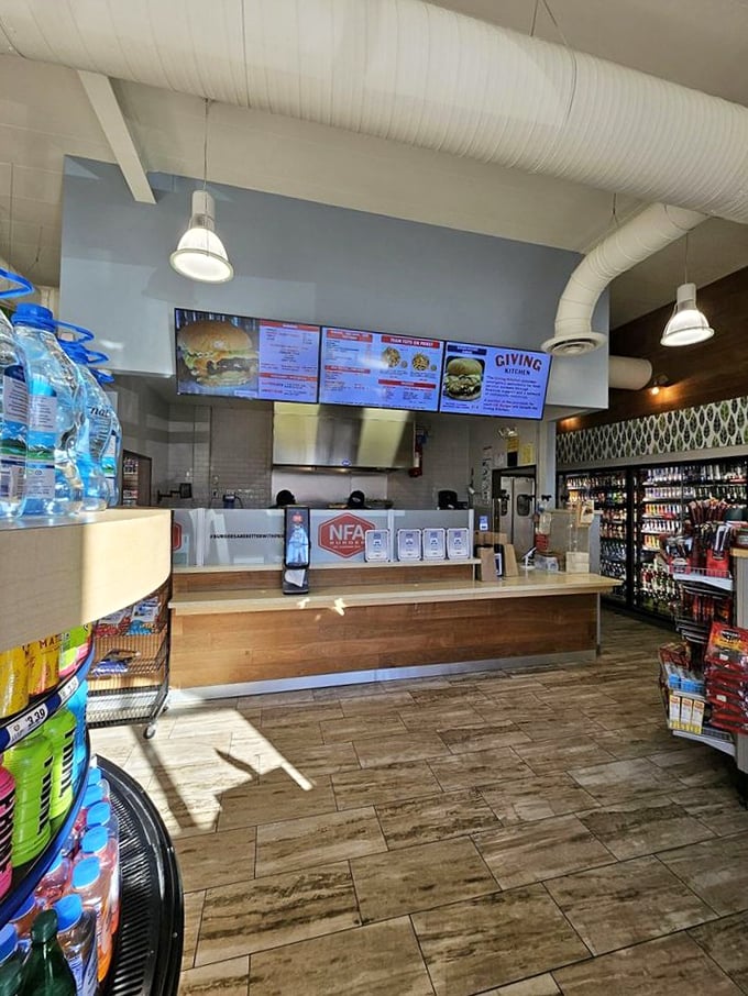 Inside, no marble columns or crystal chandeliers&mdash;just the pure, honest theater of burger-making where every sizzle promises deliciousness to come.