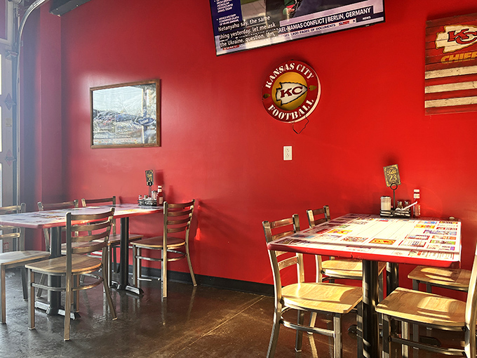 Chiefs fans feel right at home amid these red walls, where breakfast and football loyalty happily coexist.