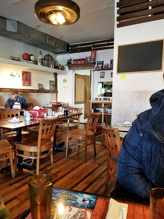 Wooden chairs, well-worn floors, and walls adorned with local memorabilia&mdash;this isn't interior design, it's a history lesson served with coffee.