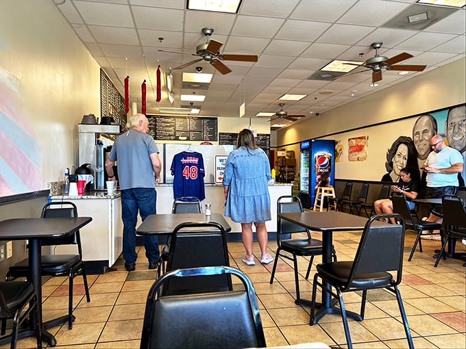 Simple black tables, ordering counter, and no-nonsense atmosphere - exactly how a real deli should be. The focus here is purely on the food.