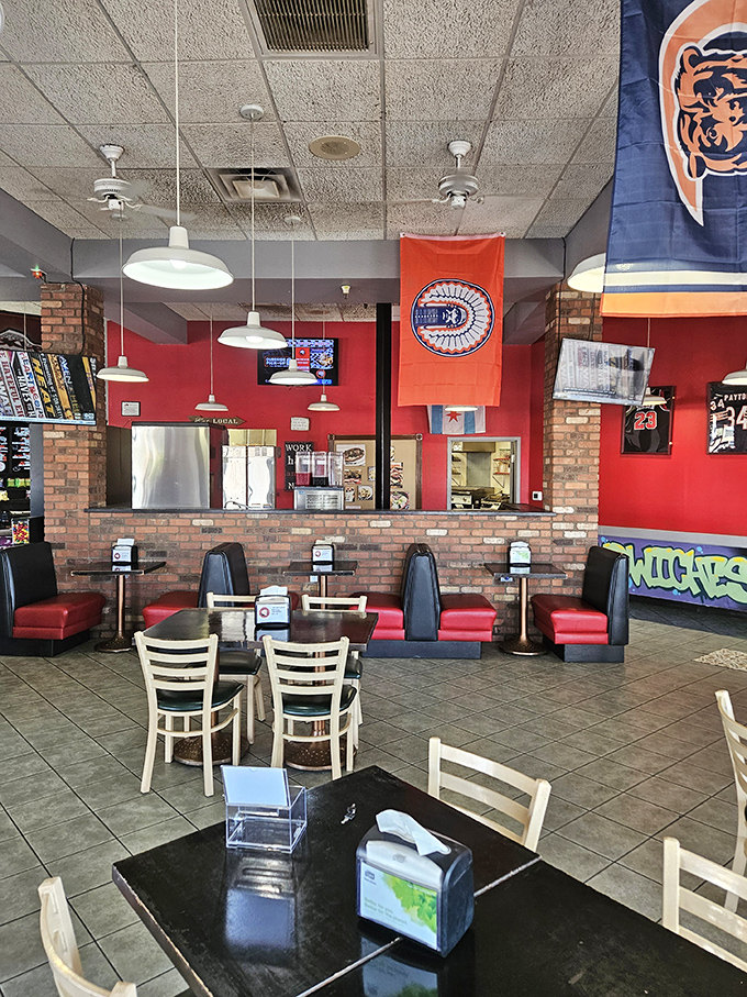 Chicago sports memorabilia adorns vibrant red walls while comfortable booths invite you to settle in. This isn't just lunch—it's a Midwest homecoming.