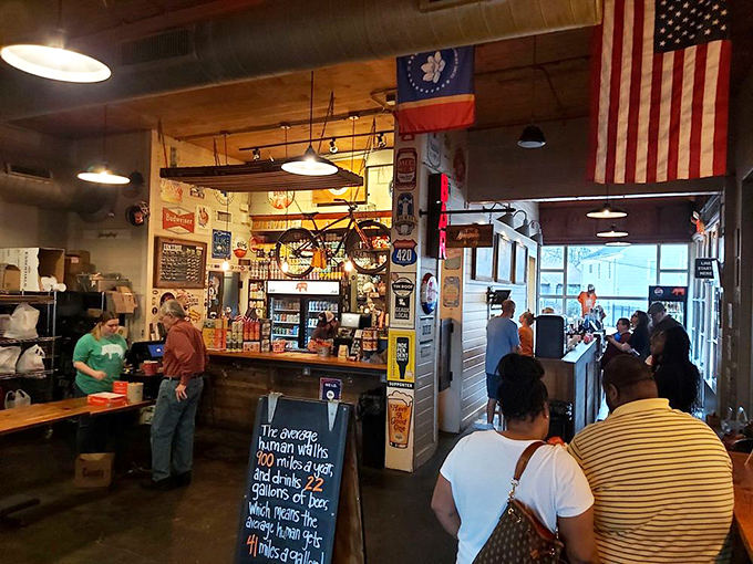 Step inside and you're greeted by rustic charm, American flags, and that bicycle on the wall that makes you wonder: "Who rode this to barbecue heaven?"