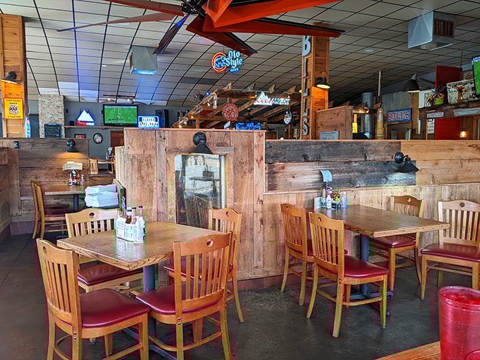 Rustic wooden dividers and classic red vinyl chairs create that perfect "I've found my new favorite spot" vibe. This isn't trendy dining; this is timeless comfort.
