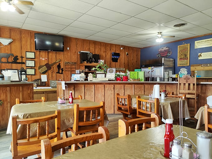 Wood-paneled walls and simple furnishings create that perfect "come as you are" atmosphere where comfort trumps pretension every time.