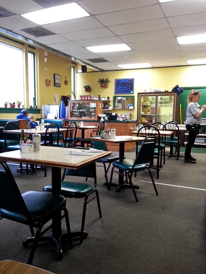 Inside, the unpretentious yellow walls and green trim create that perfect "everybody knows your name" diner atmosphere.