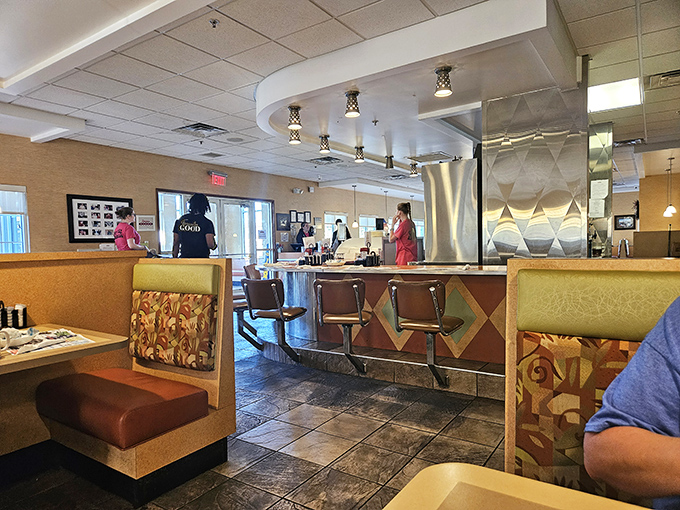 Inside, the quintessential diner experience awaits &ndash; comfortable booths, counter seating, and that unmistakable buzz of conversation and clinking plates that feels like coming home.