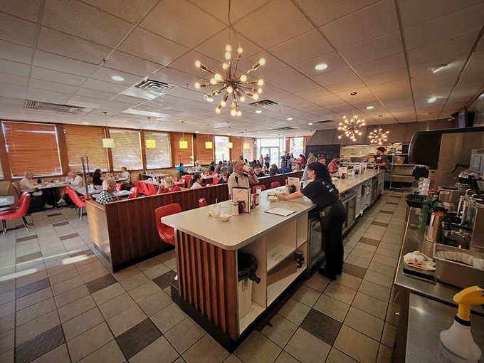 Where breakfast dreams come true. The bustling interior of Lucky's combines retro charm with the symphony of sizzling griddles and coffee refills.