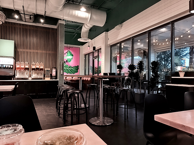 Industrial-chic meets healthy eating haven inside, where exposed ductwork and wooden accents create the perfect backdrop for your bowl-building adventure.