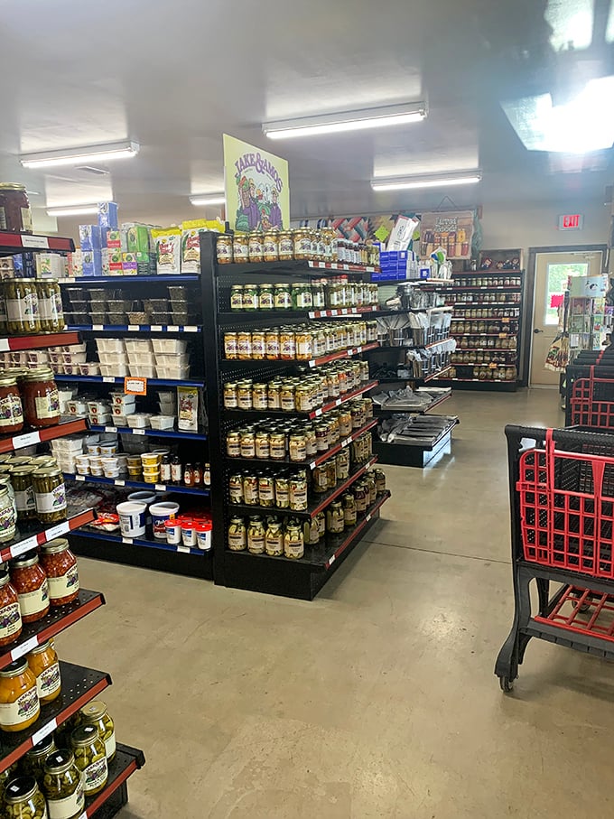 Shelves laden with homemade preserves and pantry staples create a treasure hunt atmosphere inside. Each jar contains someone's recipe, not a food scientist's formula.