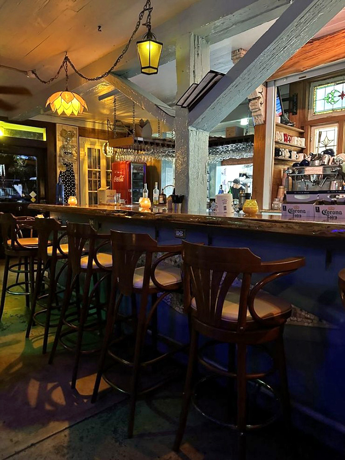 Weathered beams, warm lighting, and vintage charm create the perfect backdrop for cocktails that taste like Florida sunshine in a glass.