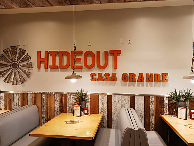That windmill wall art isn't just decoration&mdash;it's foreshadowing the whirlwind romance your taste buds are about to experience with Hideout's rustic-chic interior.