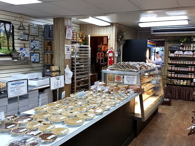 A treasure trove of baked delights awaits inside, where display cases showcase an impressive array of pies that would make even the most disciplined dieter surrender. 