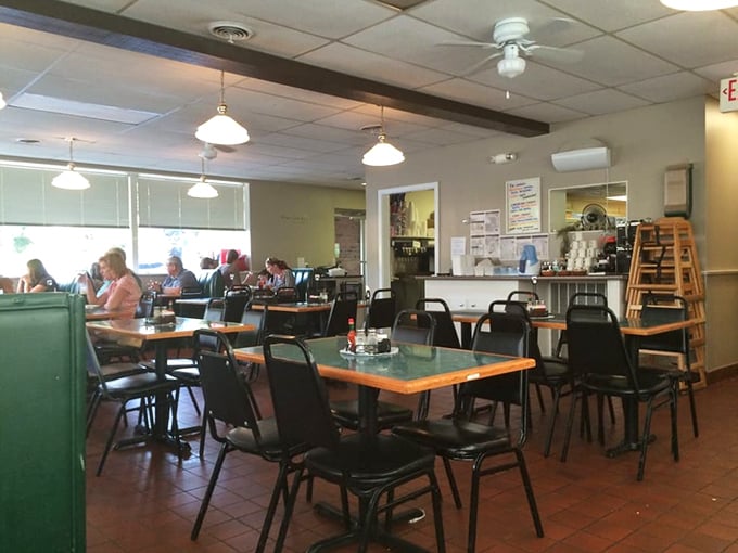 The dining room strikes that perfect balance between no-nonsense functionality and homey comfort, where conversations flow as freely as the coffee. 