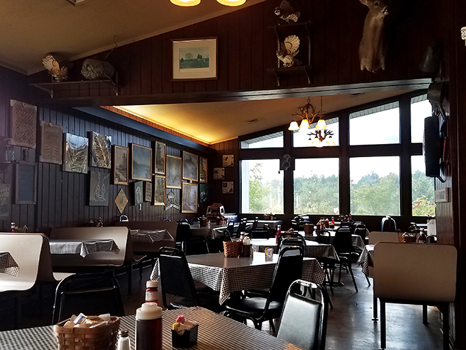 Wooden paneling, mountain views, and rustic charm create the perfect backdrop for a meal that feels like a warm hug from grandma.