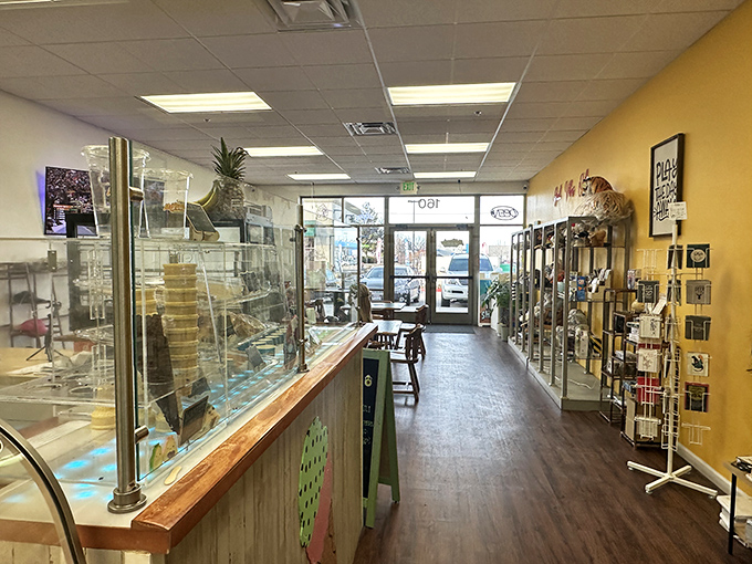 Step inside to a world where ice cream is serious business. The warm wood tones and bright interior create the perfect backdrop for frozen masterpieces.