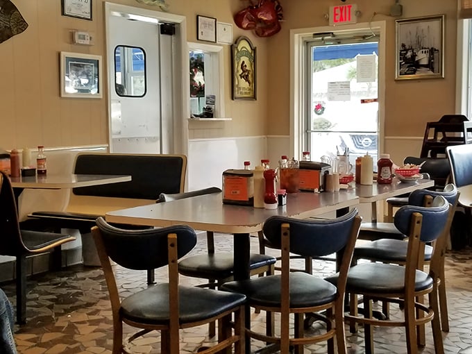 No-frills interior where conversations flow as freely as the sweet tea. The best restaurants never waste money on chandeliers when perfecting hushpuppies matters more.