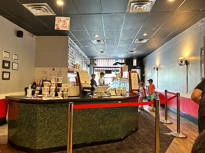 Where dreams come true at the counter. The classic black and red interior feels like stepping into an ice cream time machine.