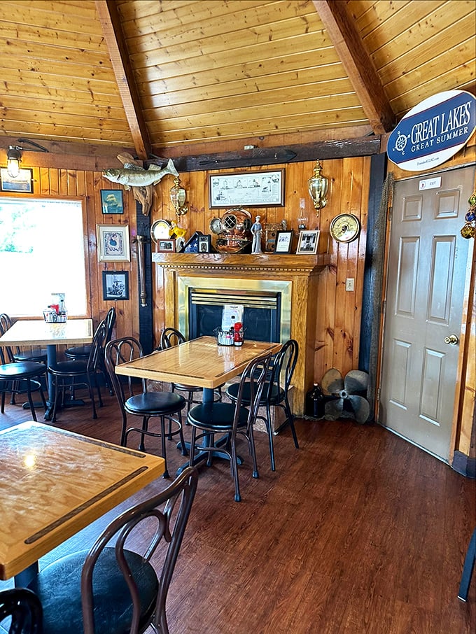 Warm wood paneling and nautical treasures create the perfect maritime hideaway. Like stepping into a ship captain's cozy quarters&mdash;with better food.