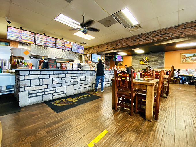 Inside, the no-frills interior lets you know immediately: this place is about the food, not fancy decor. The wooden tables have heard thousands of satisfied "mmms."