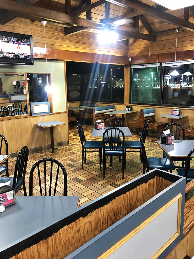 Wooden beams, warm paneling, and no-nonsense tables create the perfect backdrop for culinary memories that have nothing to do with fancy and everything to do with flavor.