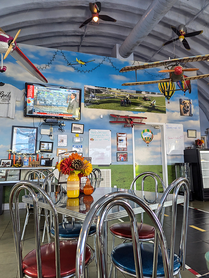 Inside, model planes soar overhead while diners enjoy hearty meals beneath sky-blue walls&mdash;somewhere, Snoopy's Red Baron is jealous.