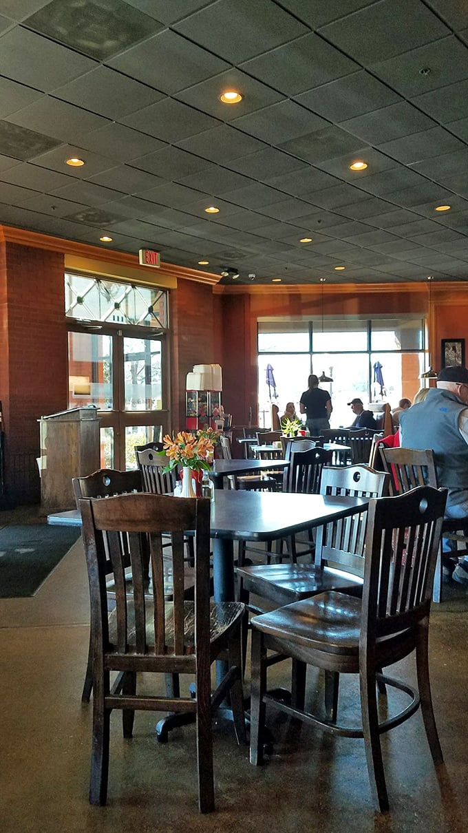 Wooden chairs, natural light, and fresh flowers create that perfect "everyone knows your name" atmosphere. The buzz of happy diners is the restaurant's natural soundtrack.