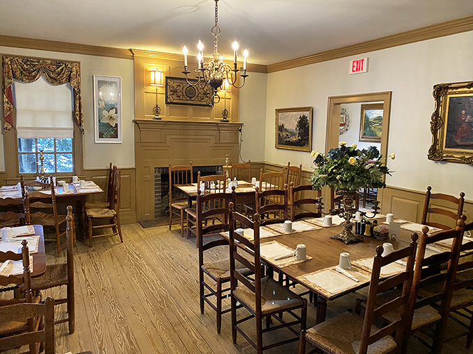Time-honored dining traditions live on in this elegant room where chandeliers cast a warm glow over wooden tables that have hosted generations of satisfied diners.