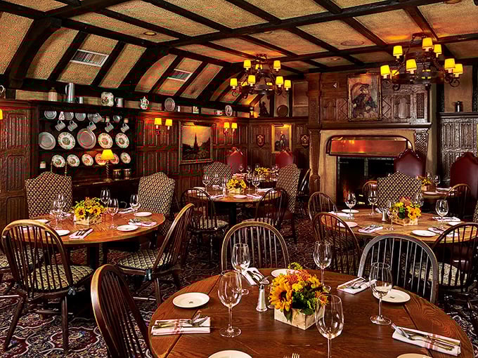 Step inside and time travel becomes real – dark wood beams, decorative plates, and amber lighting create the kind of cozy ambiance money can't manufacture.