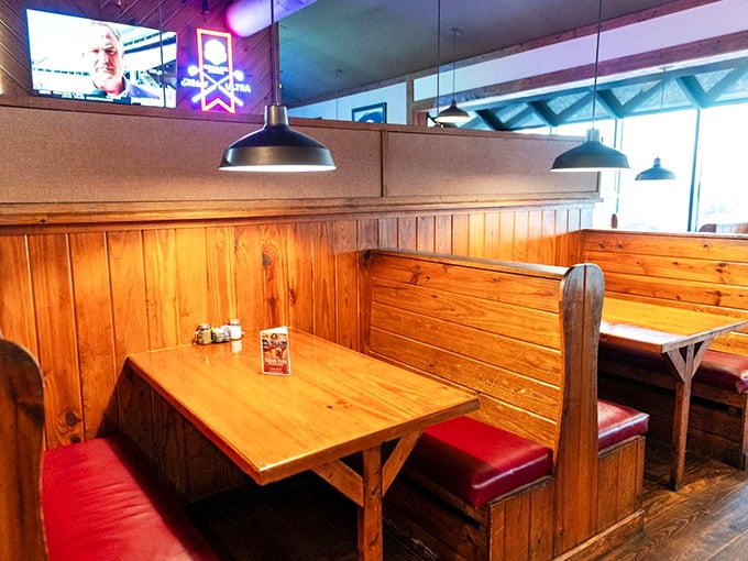 Wooden booths with red vinyl seating create that perfect "let's settle in for something special" vibe. Comfort is non-negotiable when steak is on the agenda.