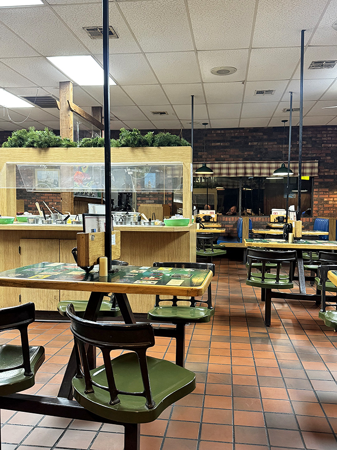 Inside, those green swivel chairs aren't winning design awards, but they've cradled the posteriors of satisfied Oklahomans for generations. Comfort seating for comfort food.