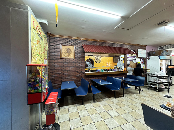 Blue bench seating, brick walls, and that nostalgic candy machine &ndash; La Sierra's interior feels like the authentic Mexican spots that food travelers dream about finding.