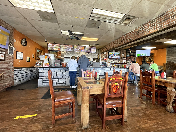 No-frills authenticity at its finest &ndash; wooden tables, exposed brick, and a counter where culinary dreams come true one order at a time.