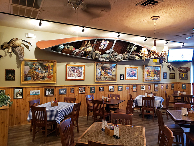 The restaurant's rustic interior features a canoe filled with fishing gear suspended from the ceiling – proof that whoever designed this place understands the art of atmosphere.