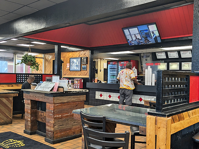 Inside, rustic wood paneling meets no-nonsense counter service. This isn't where you come for the d&eacute;cor&mdash;it's where flavor takes the throne.