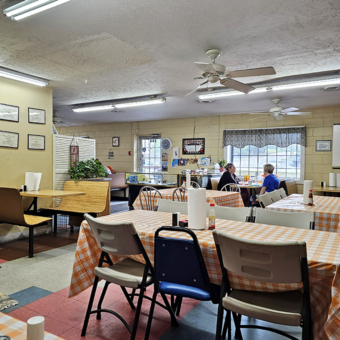 Ceiling fans lazily spin above orange-checked tablecloths &ndash; this dining room hasn't changed in decades, and thank goodness for that.