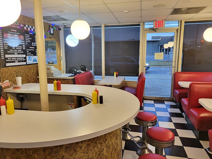 Where time stands deliciously still &ndash; the curved counter and cherry-red stools have witnessed decades of first dates, family outings, and regulars seeking burger perfection.