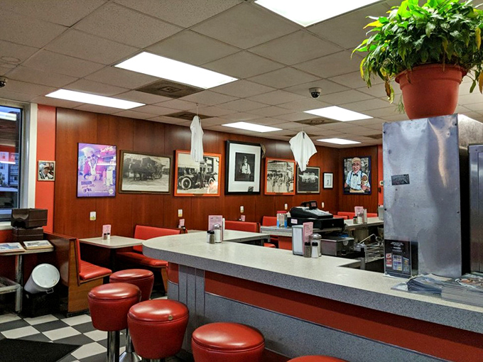 Step inside and the decades melt away&mdash;red vinyl stools, wood paneling, and black-and-white photos tell stories of countless meals shared across generations.