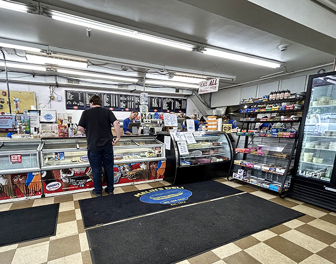 Inside, the classic deli counter awaits with its checkered floor and no-nonsense display cases. This isn't Instagram food&mdash;this is eat-with-both-hands sustenance.
