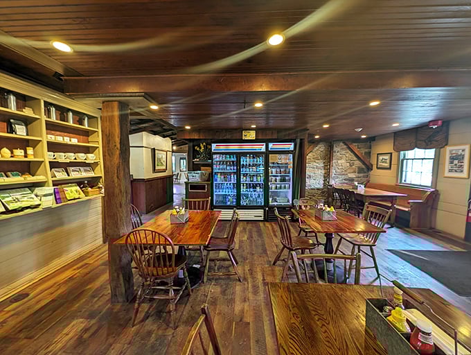 Step inside to discover wooden floors that have supported hungry travelers for generations, rustic tables that invite lingering, and an atmosphere that whispers "slow down and stay awhile." 