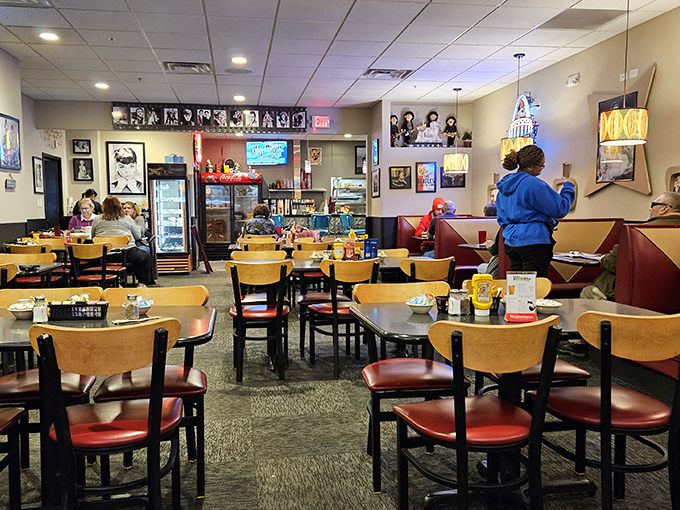 Inside Oscar's, wooden tables with red upholstery invite lingering conversations while memorabilia-lined walls tell stories of Jefferson City's past. A true community hub.