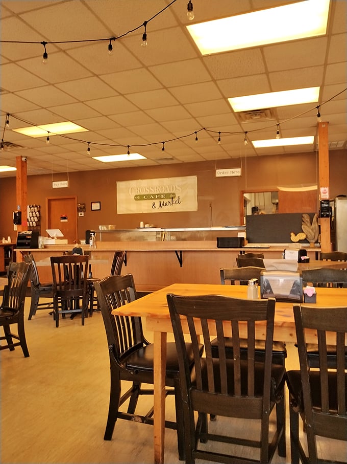 Simple wooden tables beneath string lights create that "where everybody knows your name" atmosphere that makes you feel instantly at home.