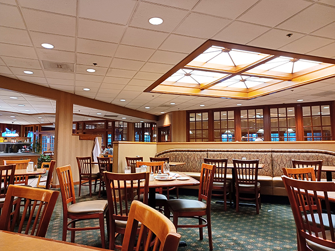 Wood paneling, comfy booths, and skylights that bathe everything in a gentle glow&mdash;this isn't just dining, it's time travel to when conversations happened face-to-face.