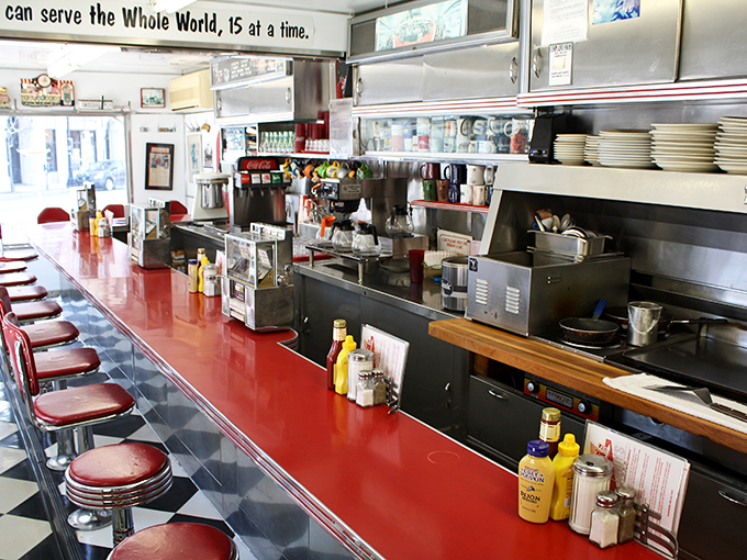 "We can serve the Whole World, 15 at a time" isn't just a slogan&mdash;it's the honest truth at this counter-only diner where every seat offers a front-row view.