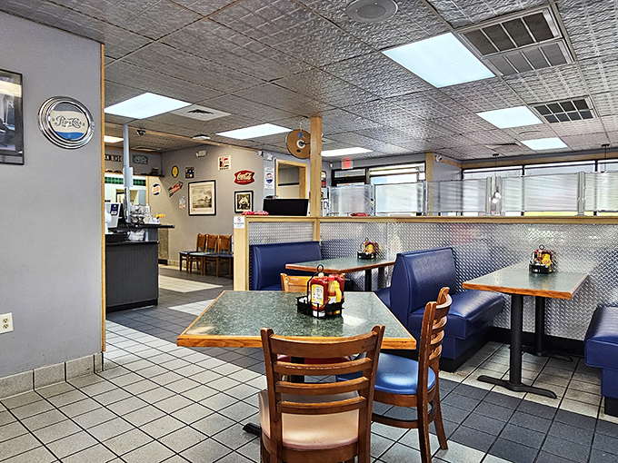 Classic diner aesthetics done right&mdash;pressed tin ceiling, blue vinyl booths, and wooden chairs that have heard thousands of breakfast debates.