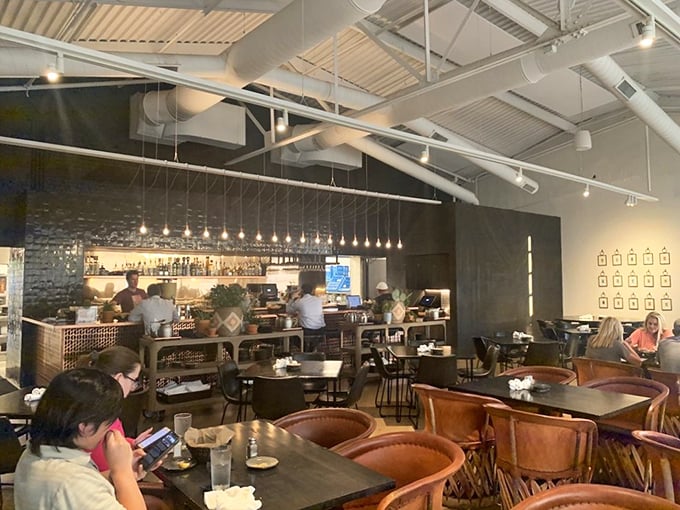 Industrial chic meets warm hospitality in Barrios' dining room, where leather chairs practically beg you to settle in for a serious taco session.