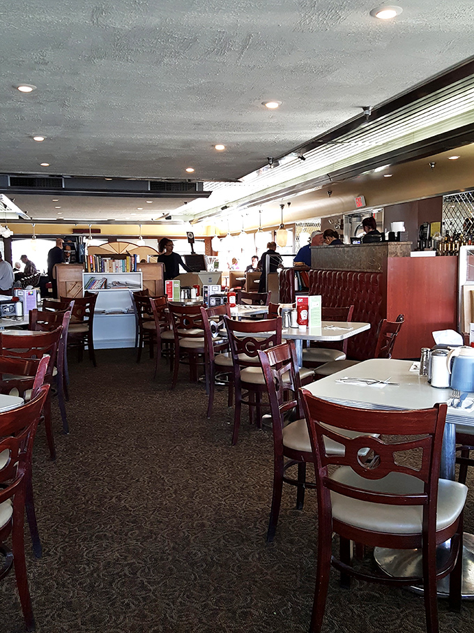 Cherry-wood booths and classic diner charm create the perfect backdrop for morning conversations and coffee refills that never seem to end. 