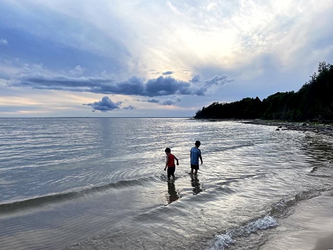 Michigan's secret Caribbean? The crystal-clear waters of Lake Michigan create a perfect playground where memories are made one splash at a time.