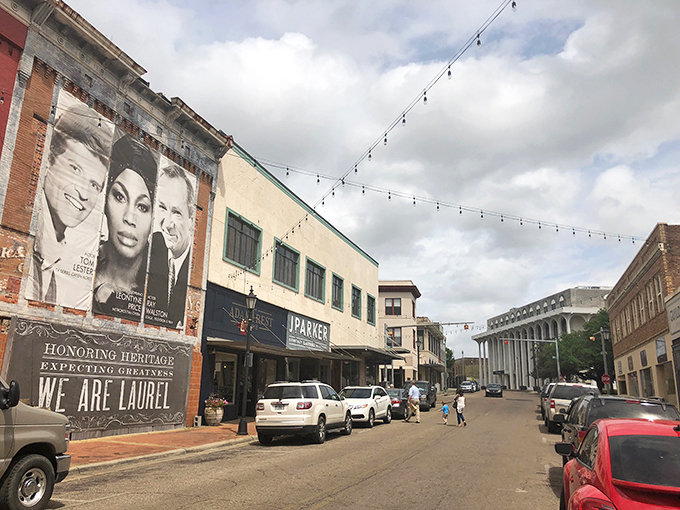 This isn't just a wall—it's Laurel's welcome mat. The vintage-style mural greets visitors with the same warmth as a neighbor's wave across the fence.