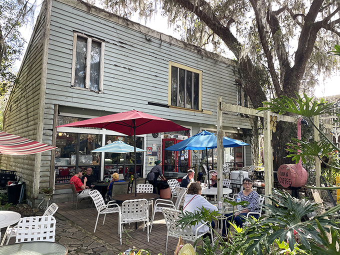 Old Florida Caf&eacute;'s weathered clapboard exterior and shaded patio invite you to slow down. The umbrellas aren't just for shade&mdash;they're for extending your coffee time.
